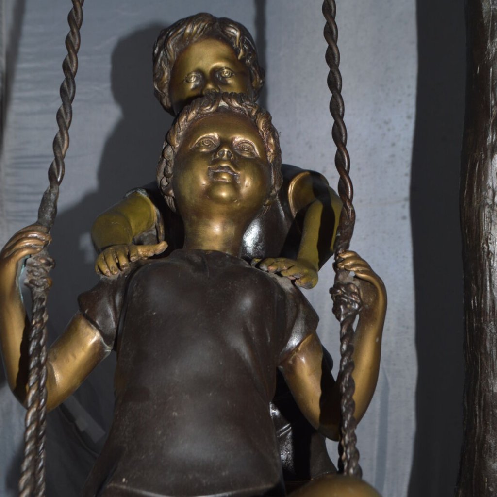 Boy Pushing Girl on Swing Statue - Arturban Statue